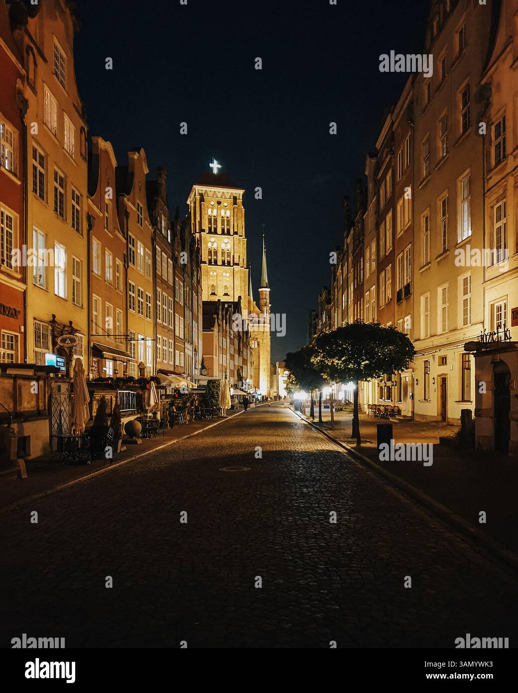 Gdansk old town at night, vertical image. Perspective view of Piwna ...