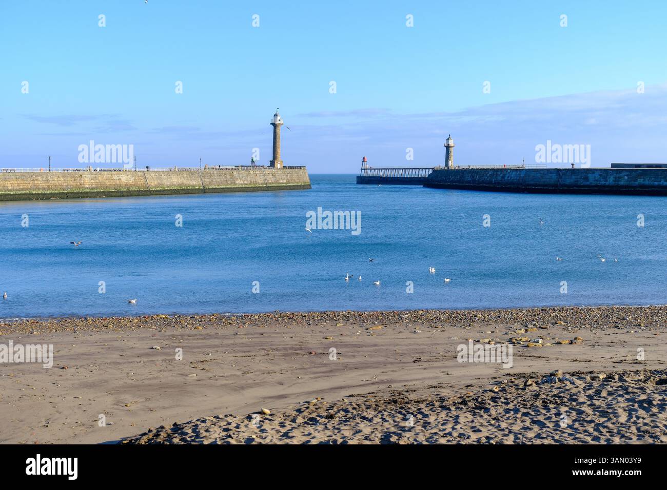 11 April 2025 - Whitby, UK - The harbour breakwater entrance at Whitby ...