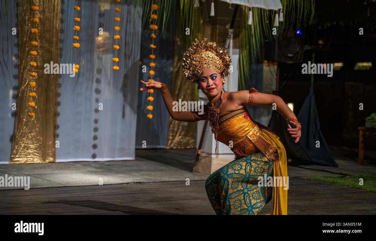 Bali, Indonesia - November 11, 2023: Elegant dancer strikes a poised ...