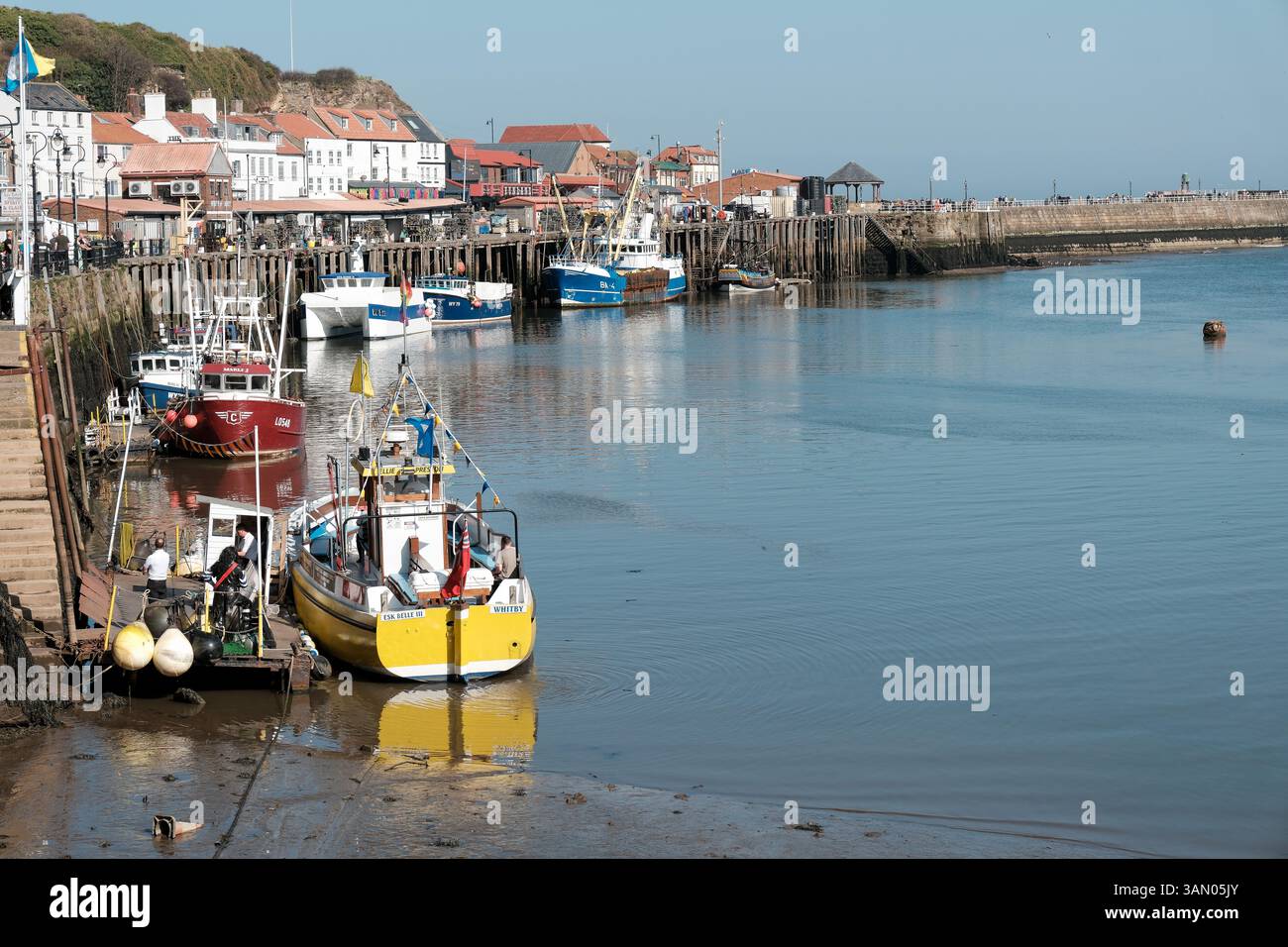 12 April 2025 - Whitby, UK - Fishing boats moored in the Harbourside ...
