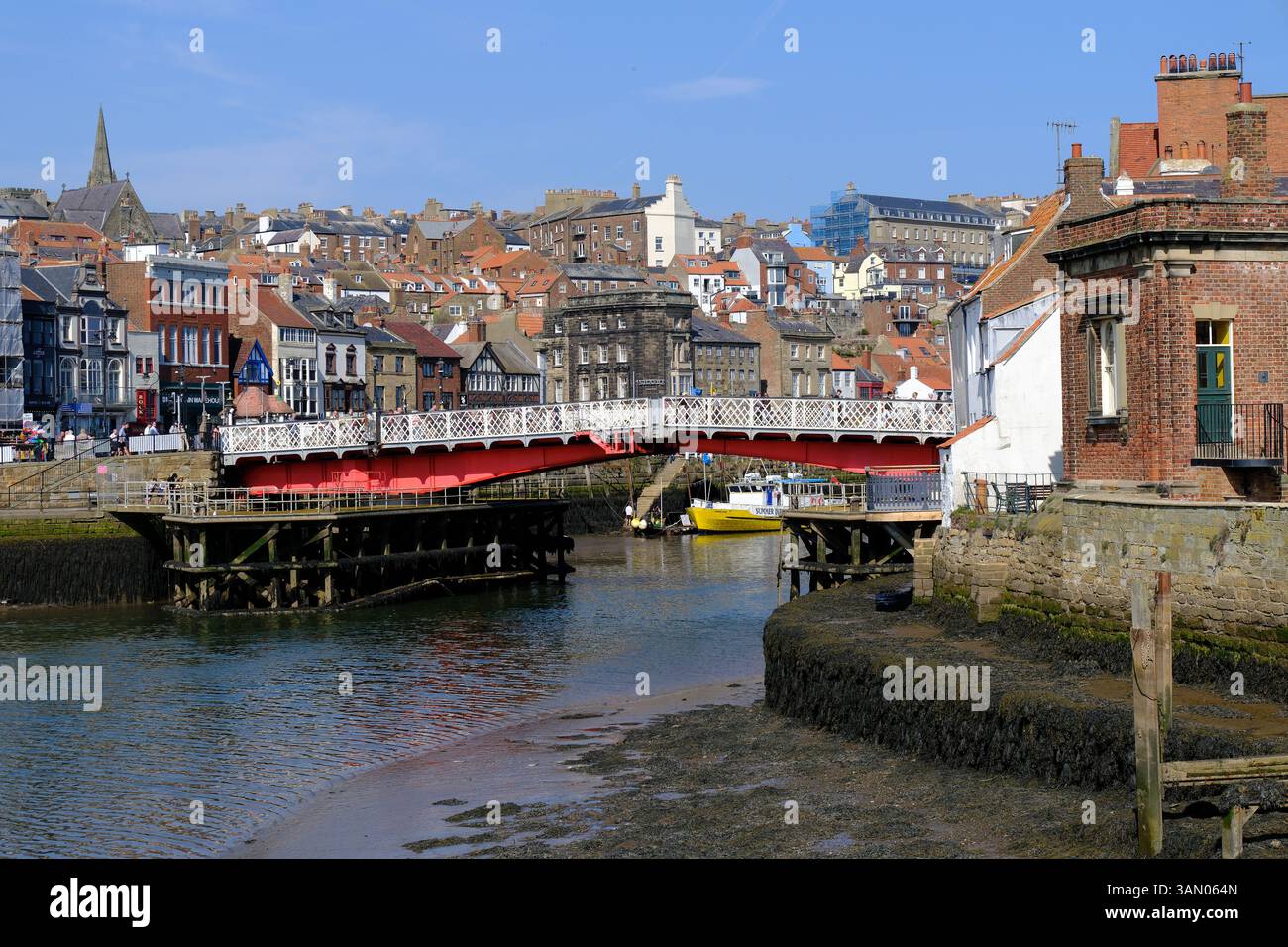 12 April 2025 - Whitby, UK - The harbour entrance and Swing Bridge in ...