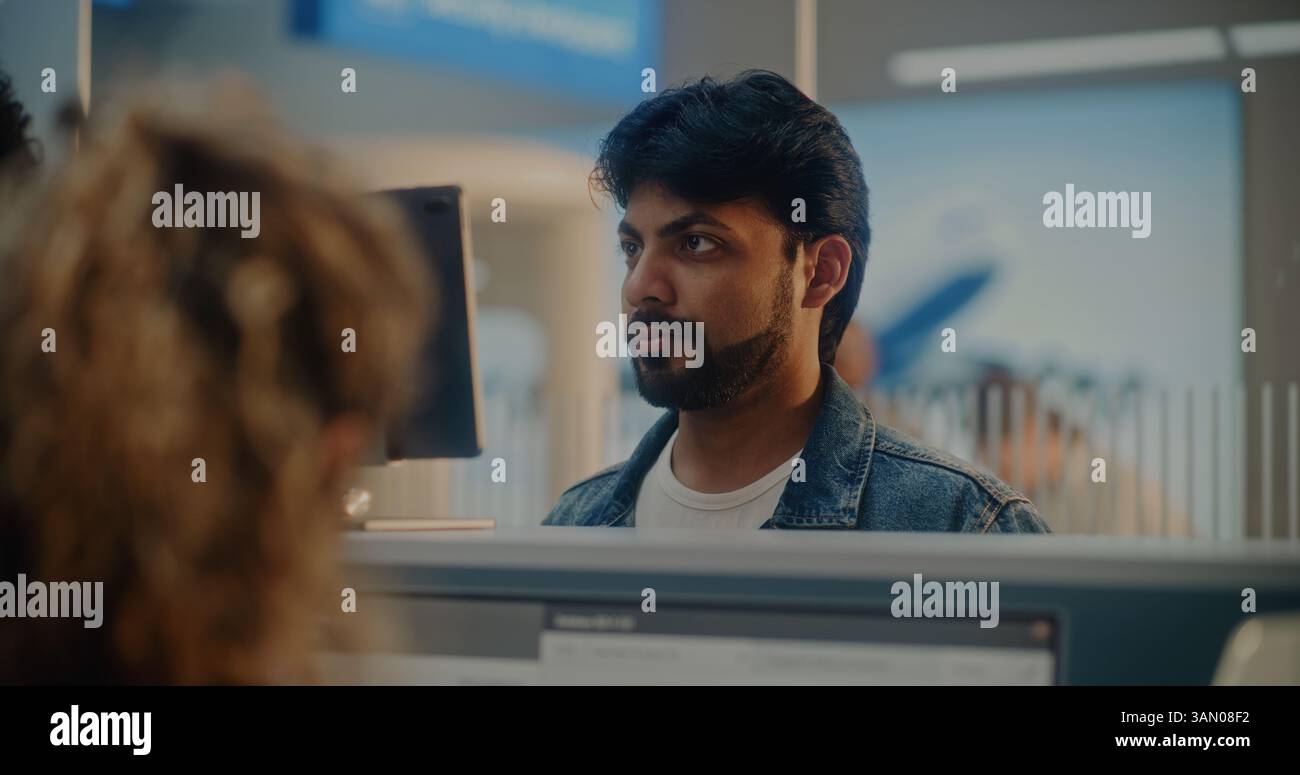 Airport Check-in Counter: Indian Man Verifying Biometric Data by Facial ...