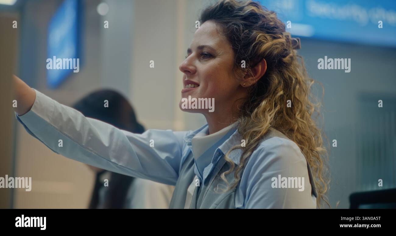 Airport Counter: Close Up of Female Airline Check-in Attendant ...
