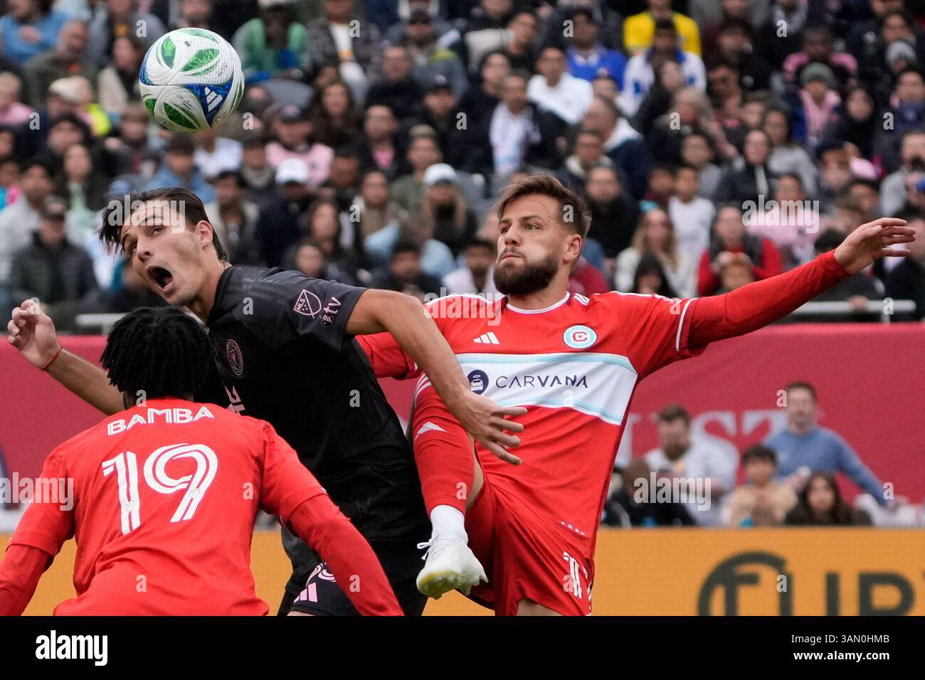 Inter Miami midfielder Federico Redondo, center, heads the ball as ...