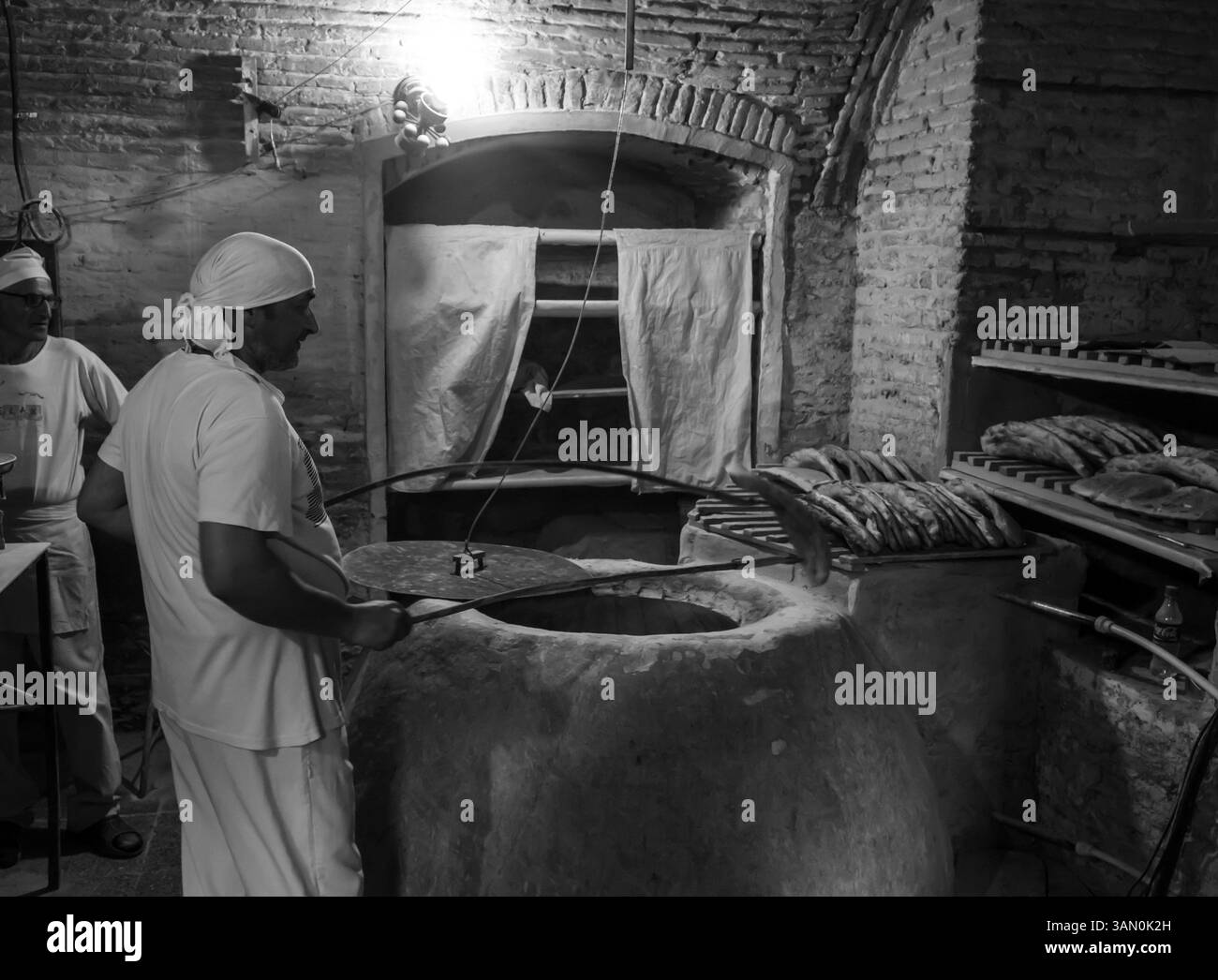 Fire burning in restaurant fireplace Black and White Stock Photos ...