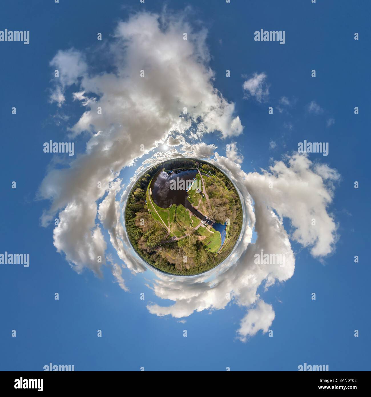 simple little tiny planet without buildings in blue sky with sun and ...