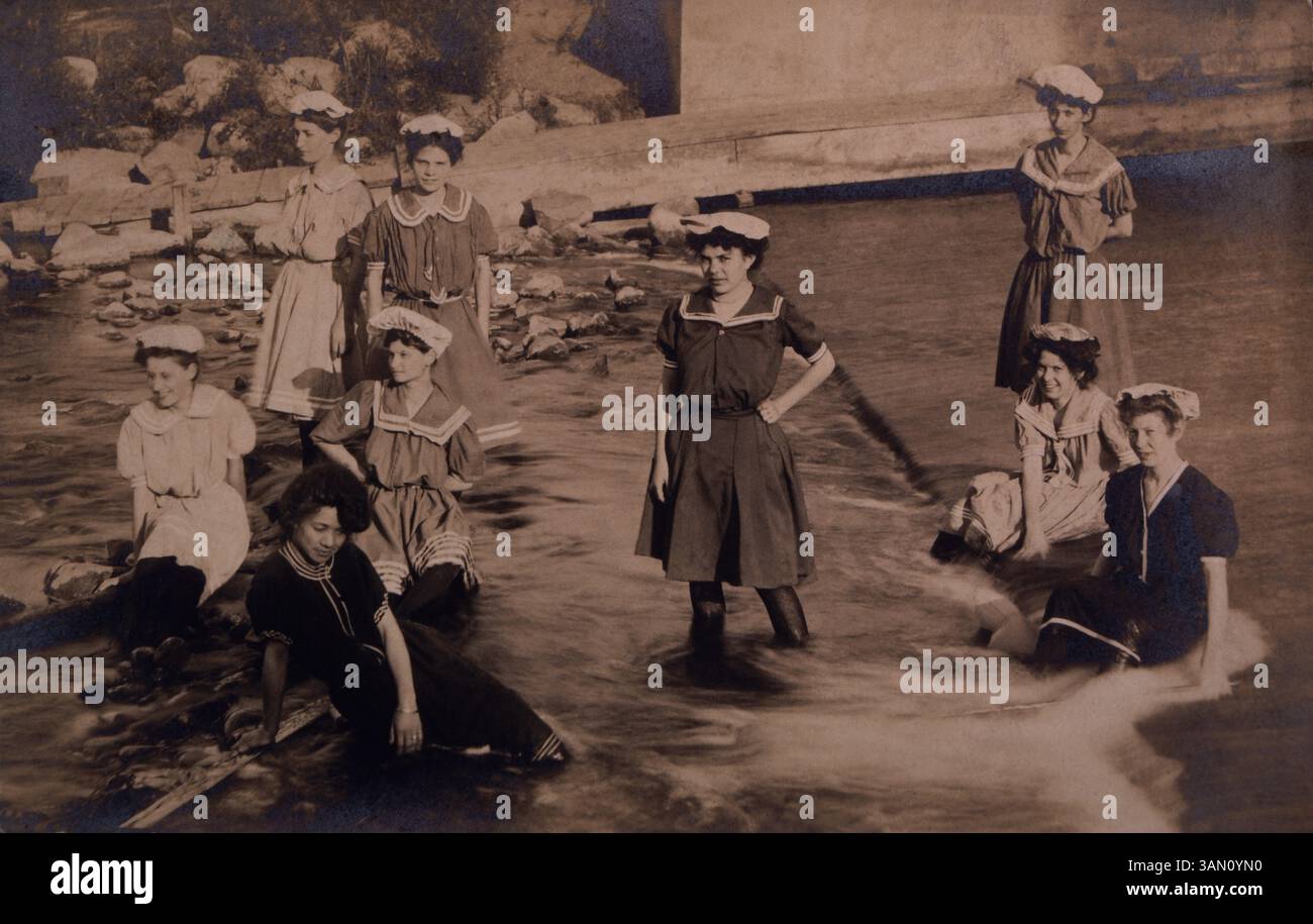 June 1, 1900 - Group of Women in One-Piece Bathing Suits Wading and ...