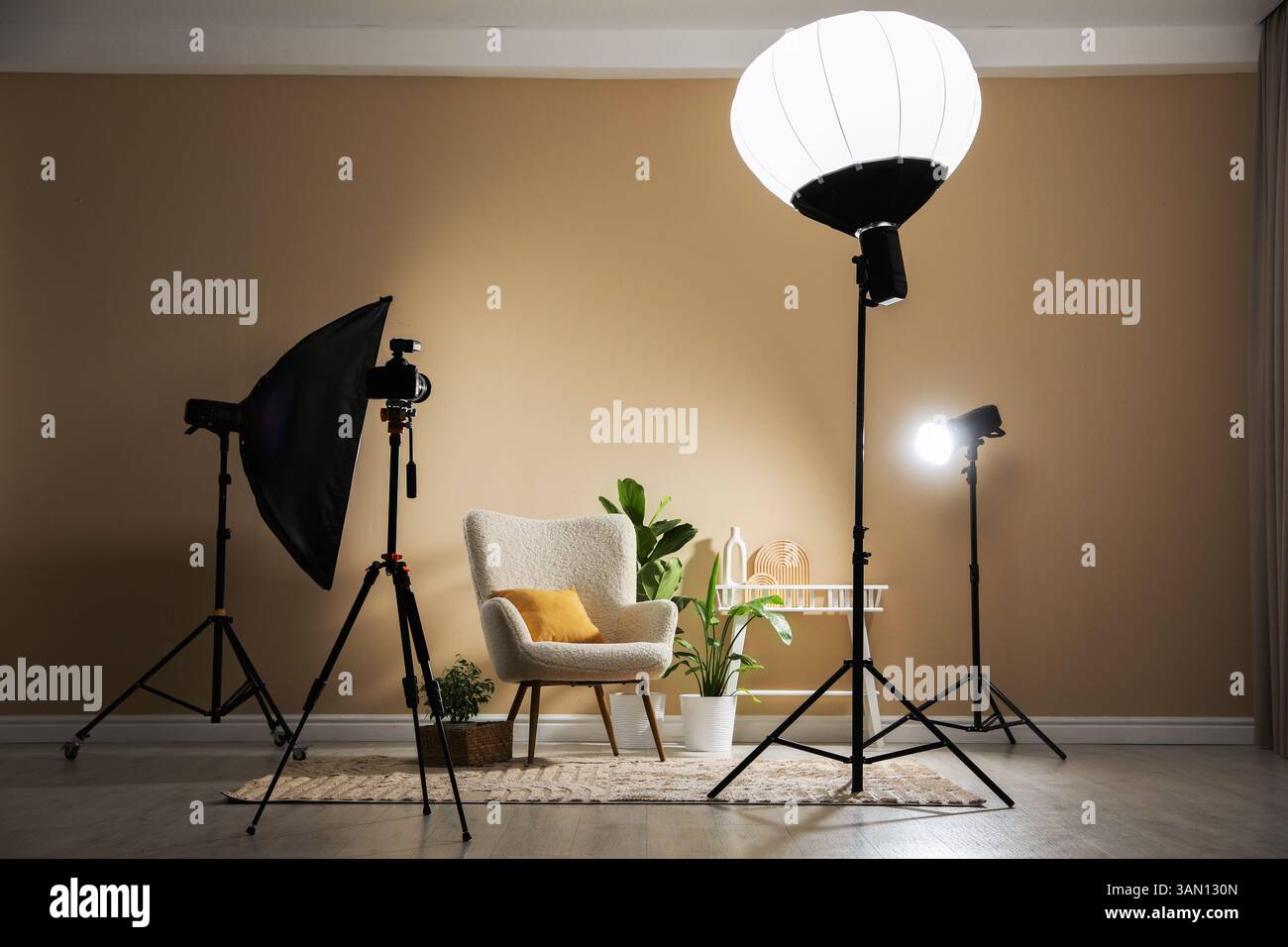 Professional photo studio equipment prepared for shooting living room ...
