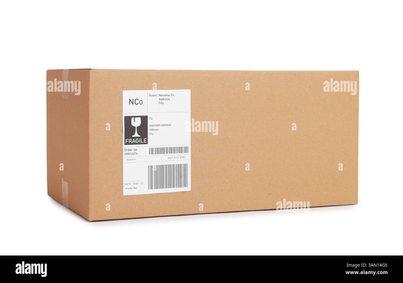 One parcel with shipment label isolated on white Stock Photo - Alamy