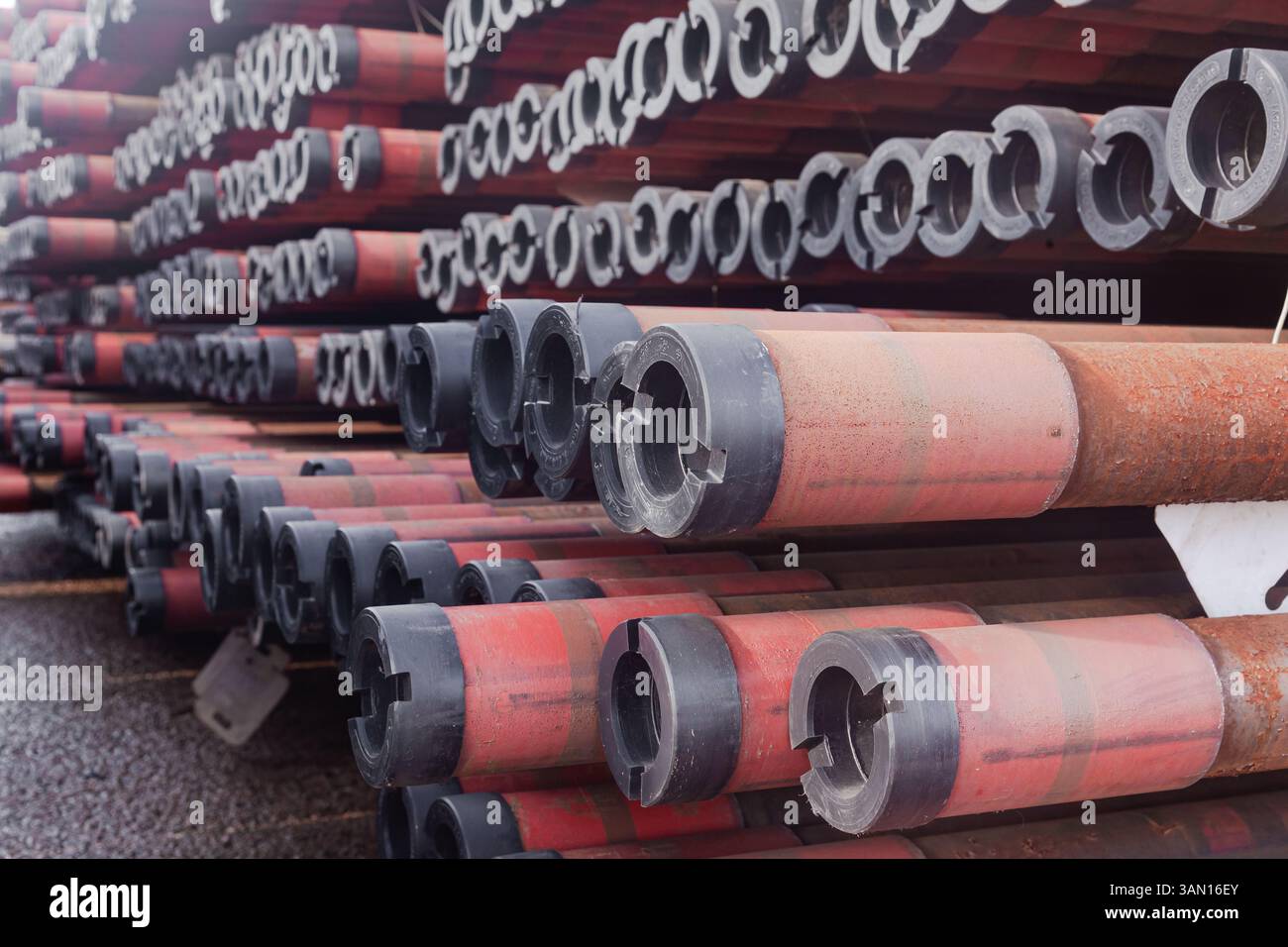 Open warehouse for storing steel pipes of various diameters on the ...