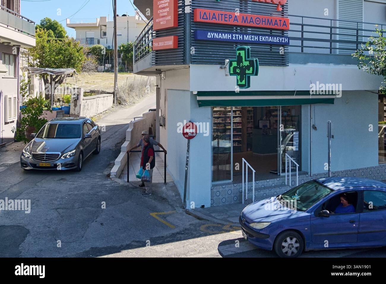 Crete.Greece - april 14, 2025: Modern pharmacy featuring a prominent ...