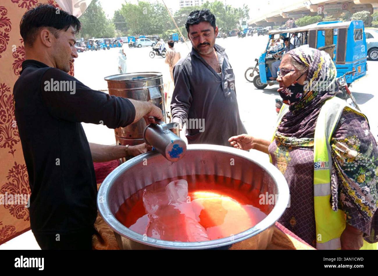 People are quenching their thirst by chilled juice to beat the heat of ...