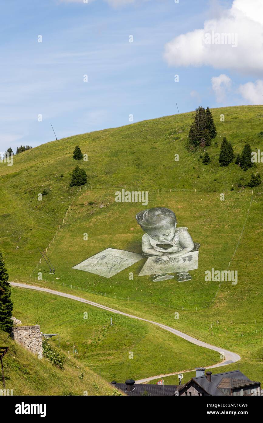 Villar sur Ollon, Switzerland - July 20. 2023: Giant painting of a girl ...