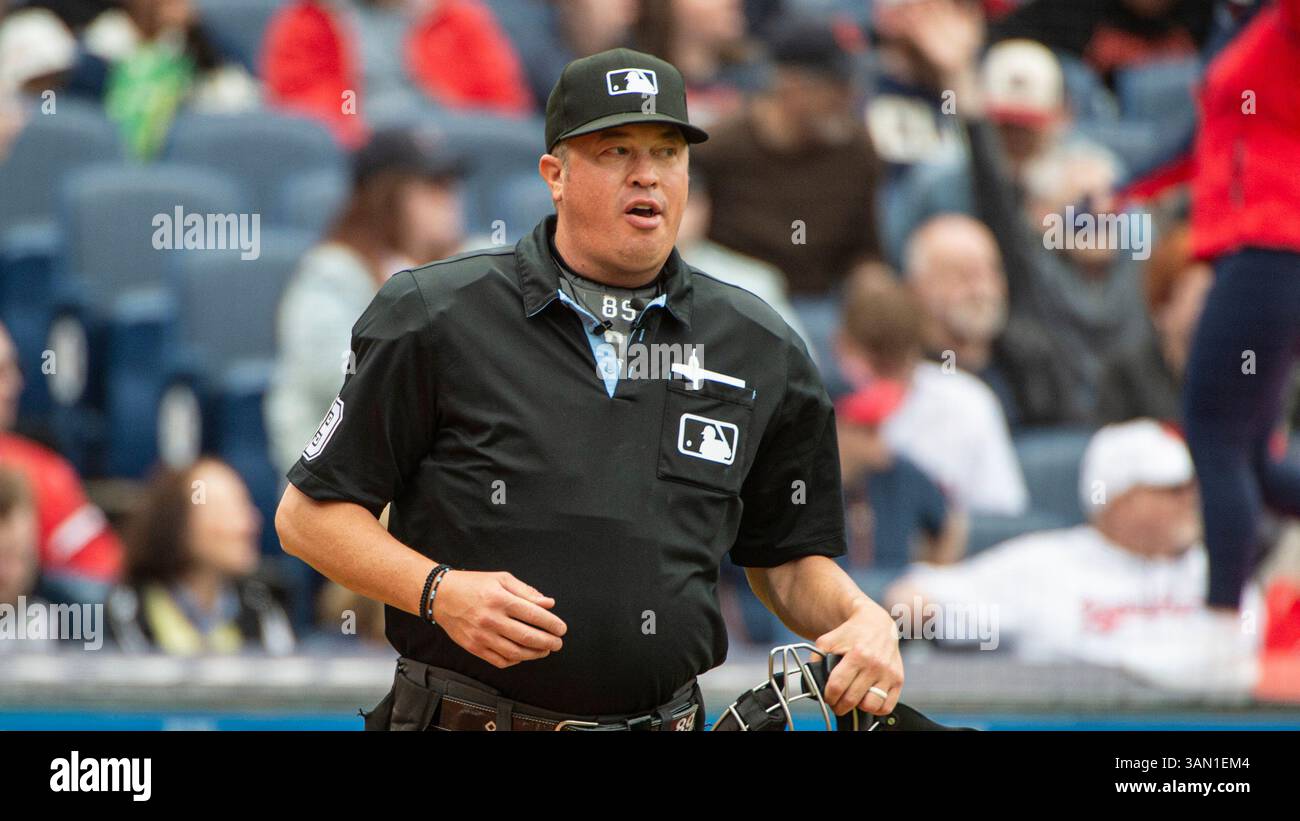 umpire Cory Blaser watches warm ups during a Cleveland Guardians Kansas ...