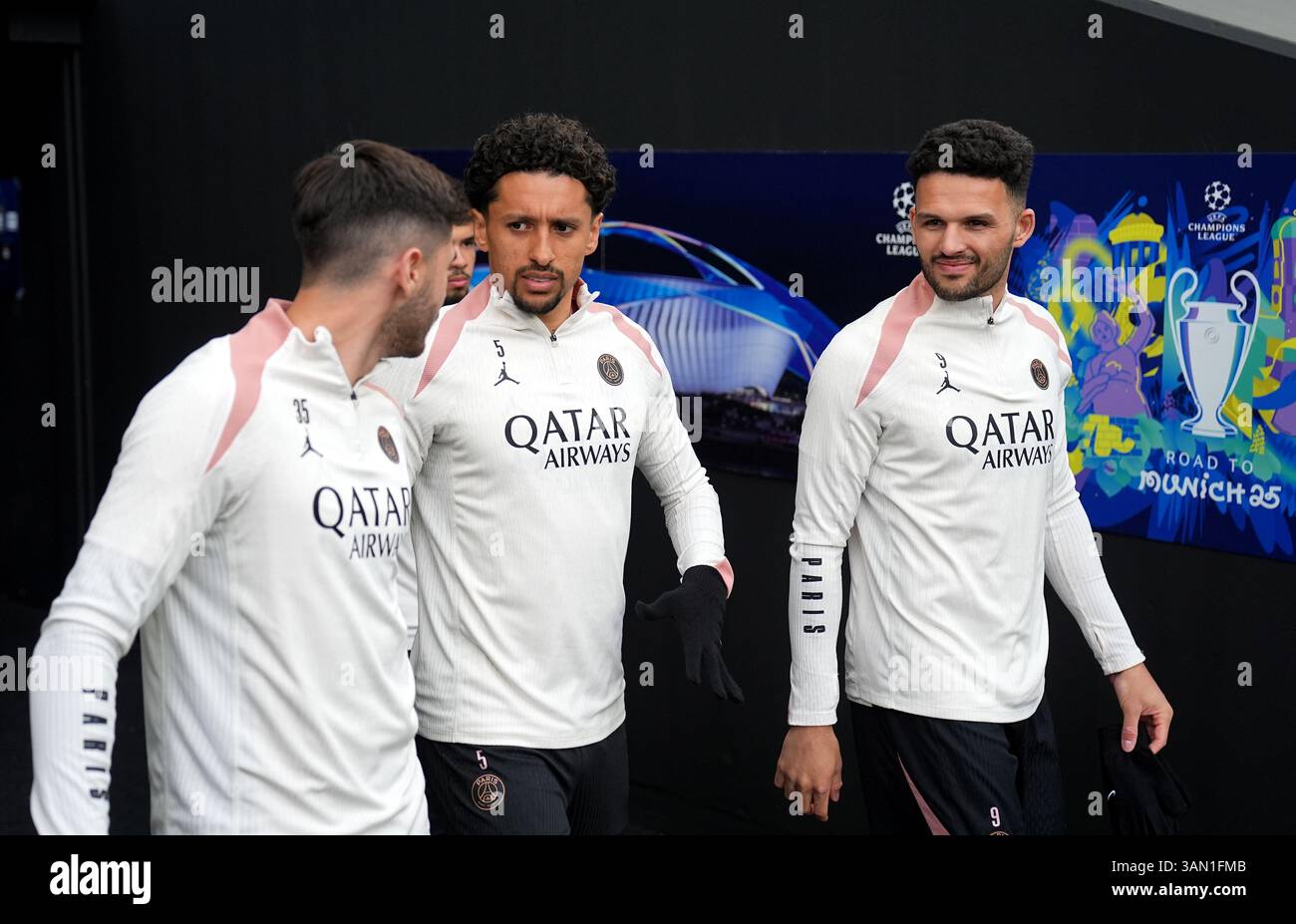 Paris Saint-Germain's Lucas Beraldo (left), Marquinhos and Goncalo Ramos (right) during a ...