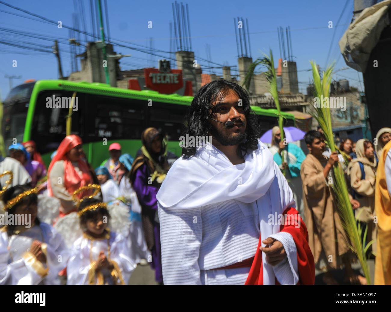 An actor representing Jesus taking part during the reenactment of the ...