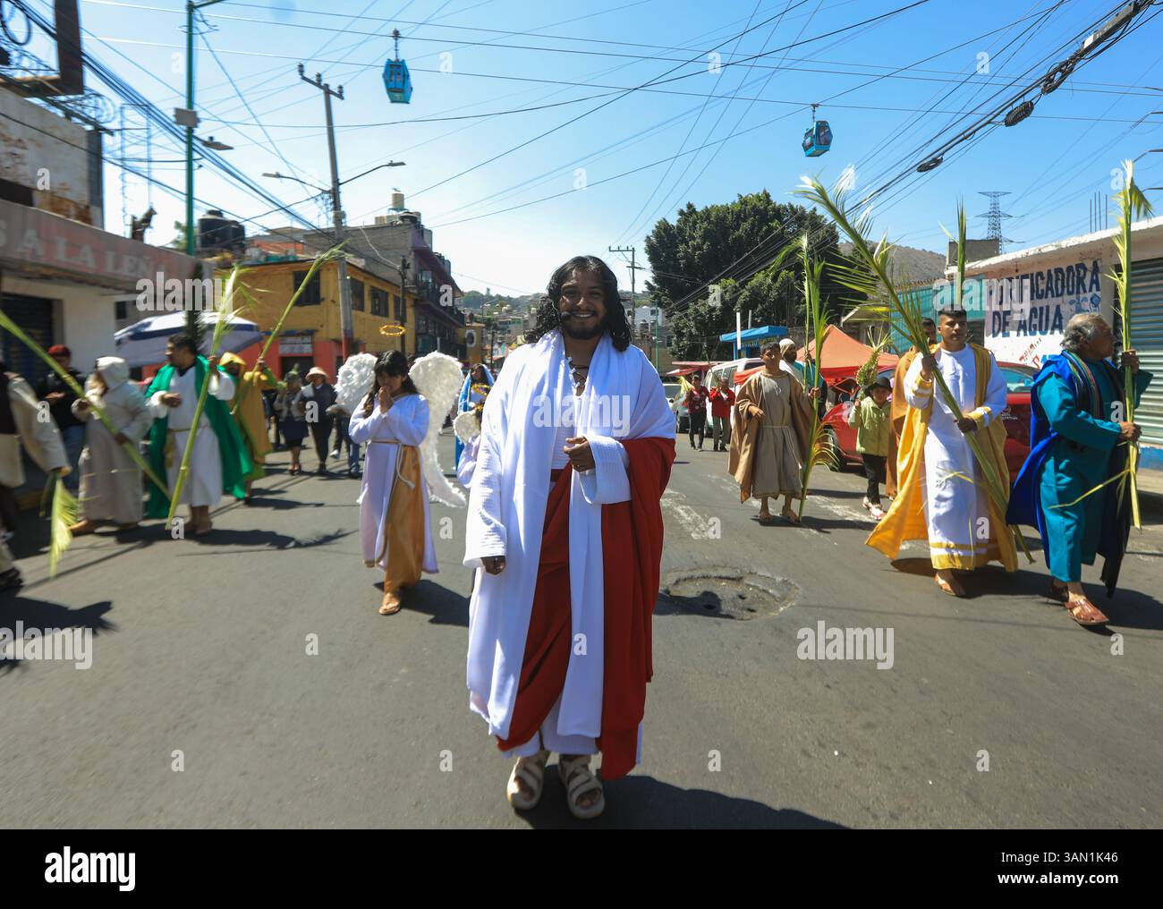 An actor representing Jesus taking part during the reenactment of the ...