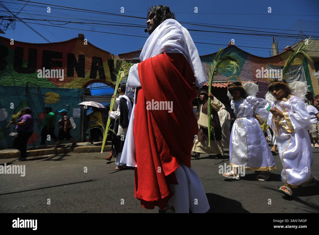 An actor representing Jesus taking part during the reenactment of the ...