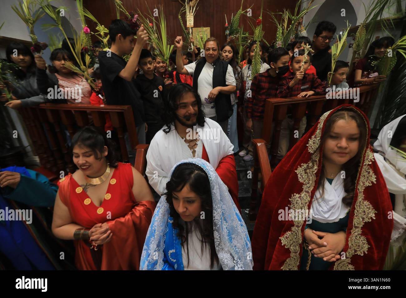 An actor representing Jesus taking part during the reenactment of the ...
