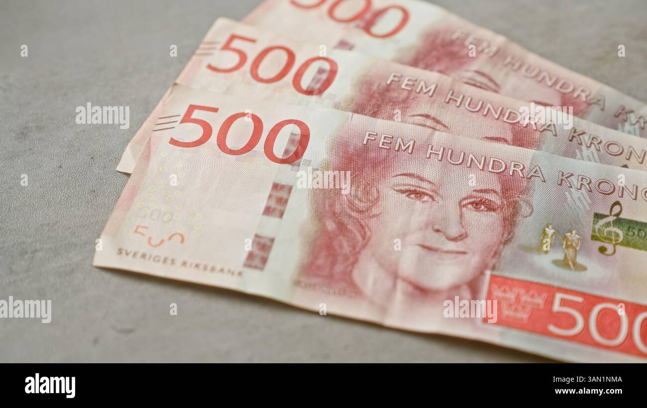 Swedish banknotes on a concrete surface showcasing the 500 kronor ...