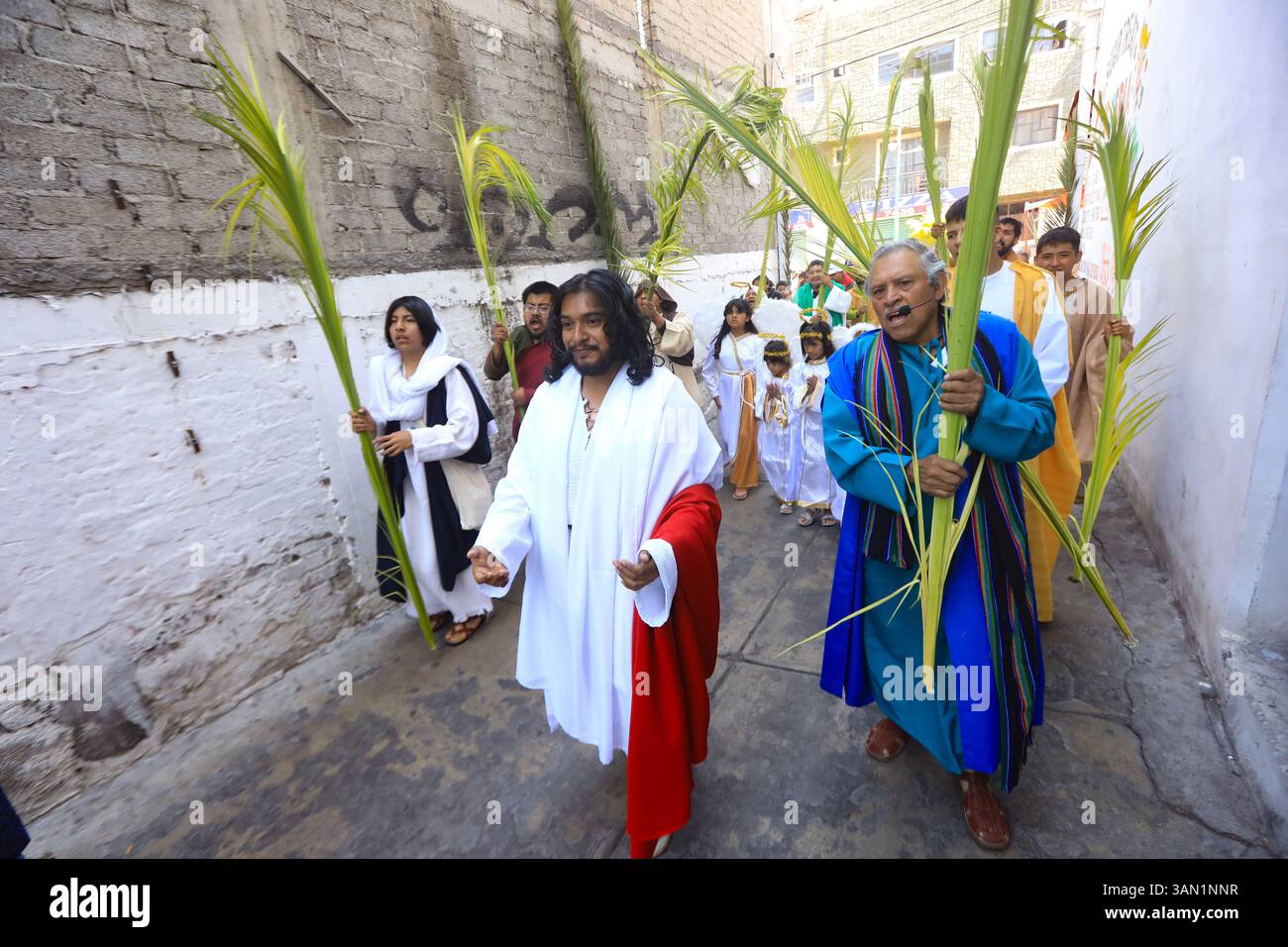 An actor representing Jesus taking part during the reenactment of the ...