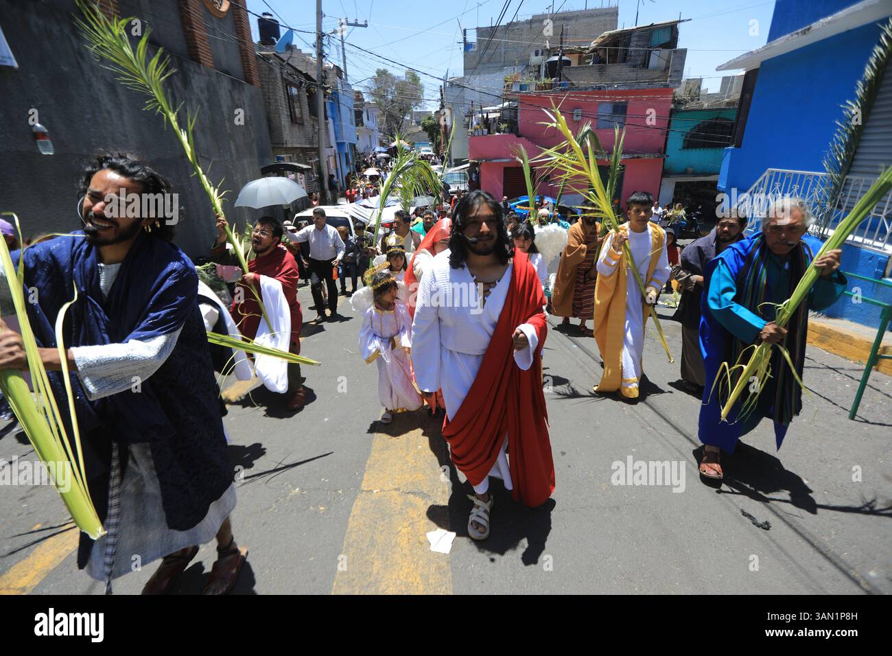 An actor representing Jesus taking part during the reenactment of the ...