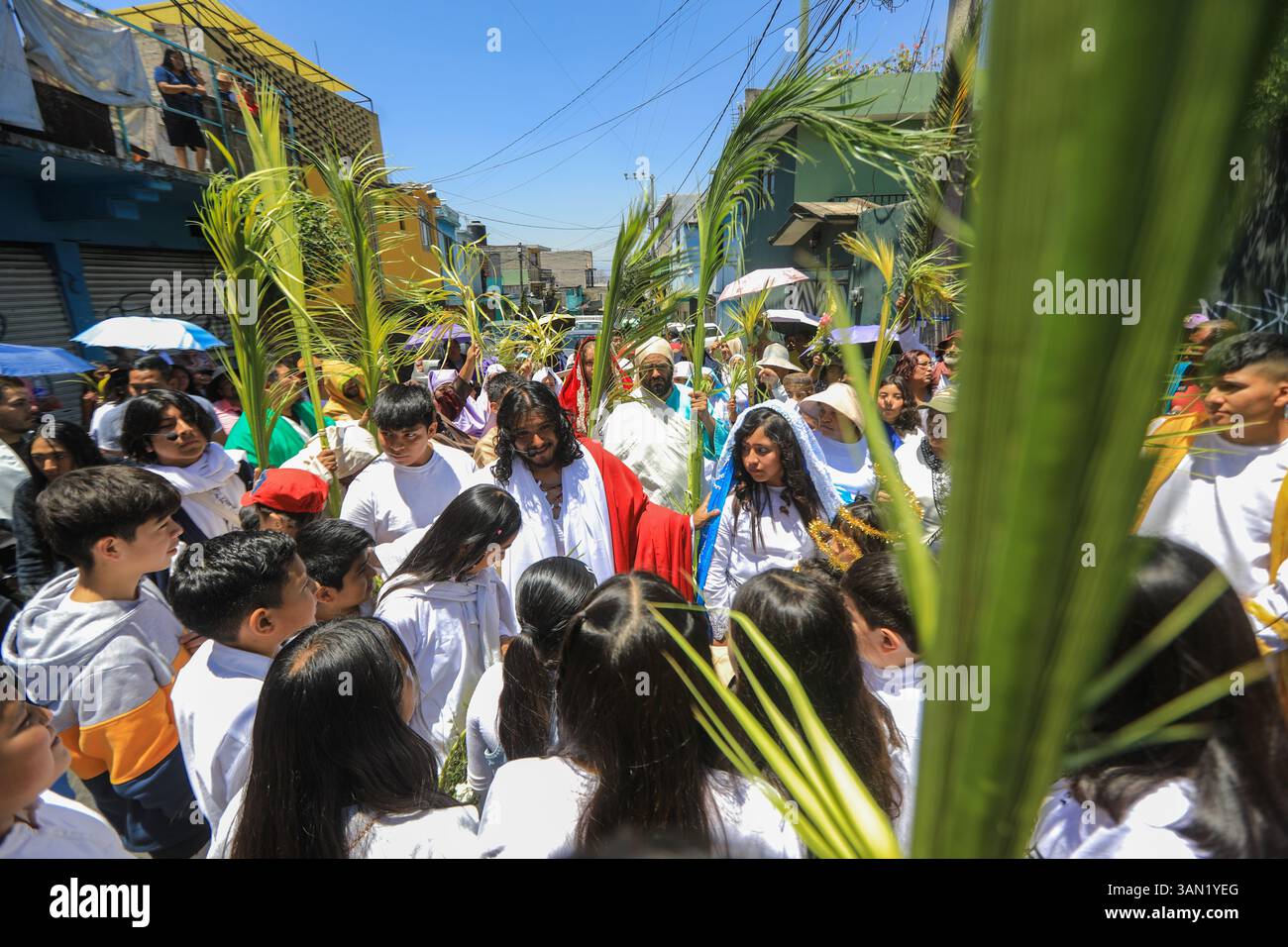 An actor representing Jesus taking part during the reenactment of the ...