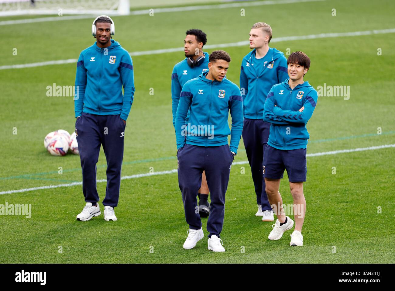 Coventry City's Raphael Borges Rodrigues (centre) and team-mates ...