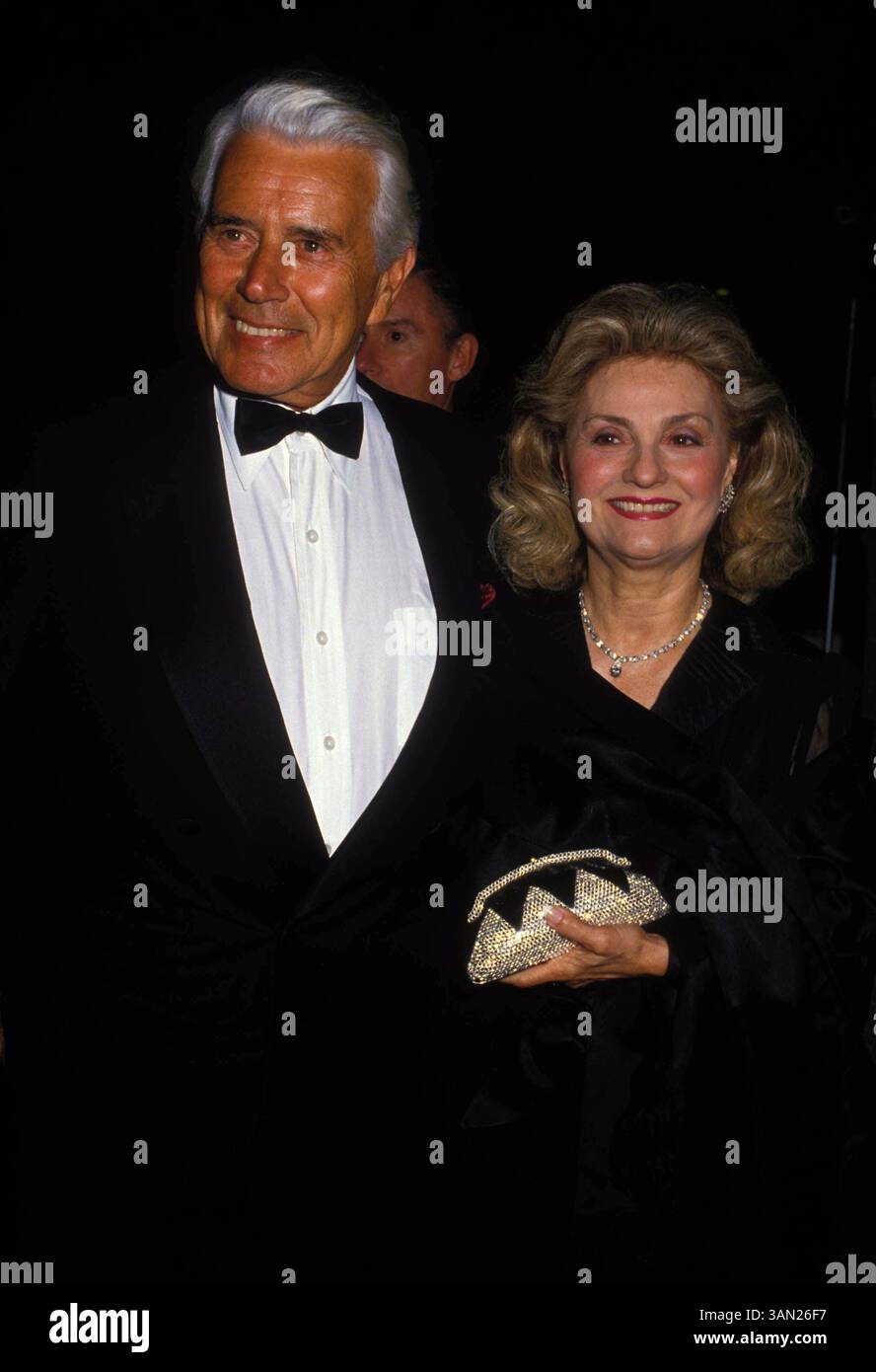 Dec. 00, 1987 - JOHN FORSYTHE WITH HIS WIFE JULIE WARREN 1987.# 14659 ...
