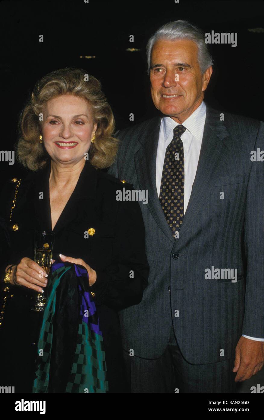 Dec. 00, 1987 - JOHN FORSYTHE WITH HIS WIFE JULIE WARREN 1987.# 14747.JOHNFORSYTHERETRO.(Credit ...