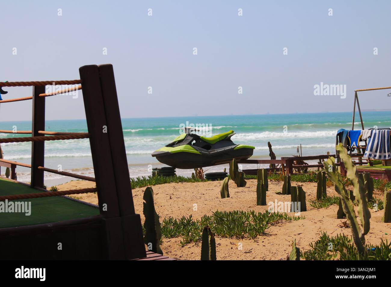 Jet skis on sandy agadir beach with view of blue ocean in agadir ...