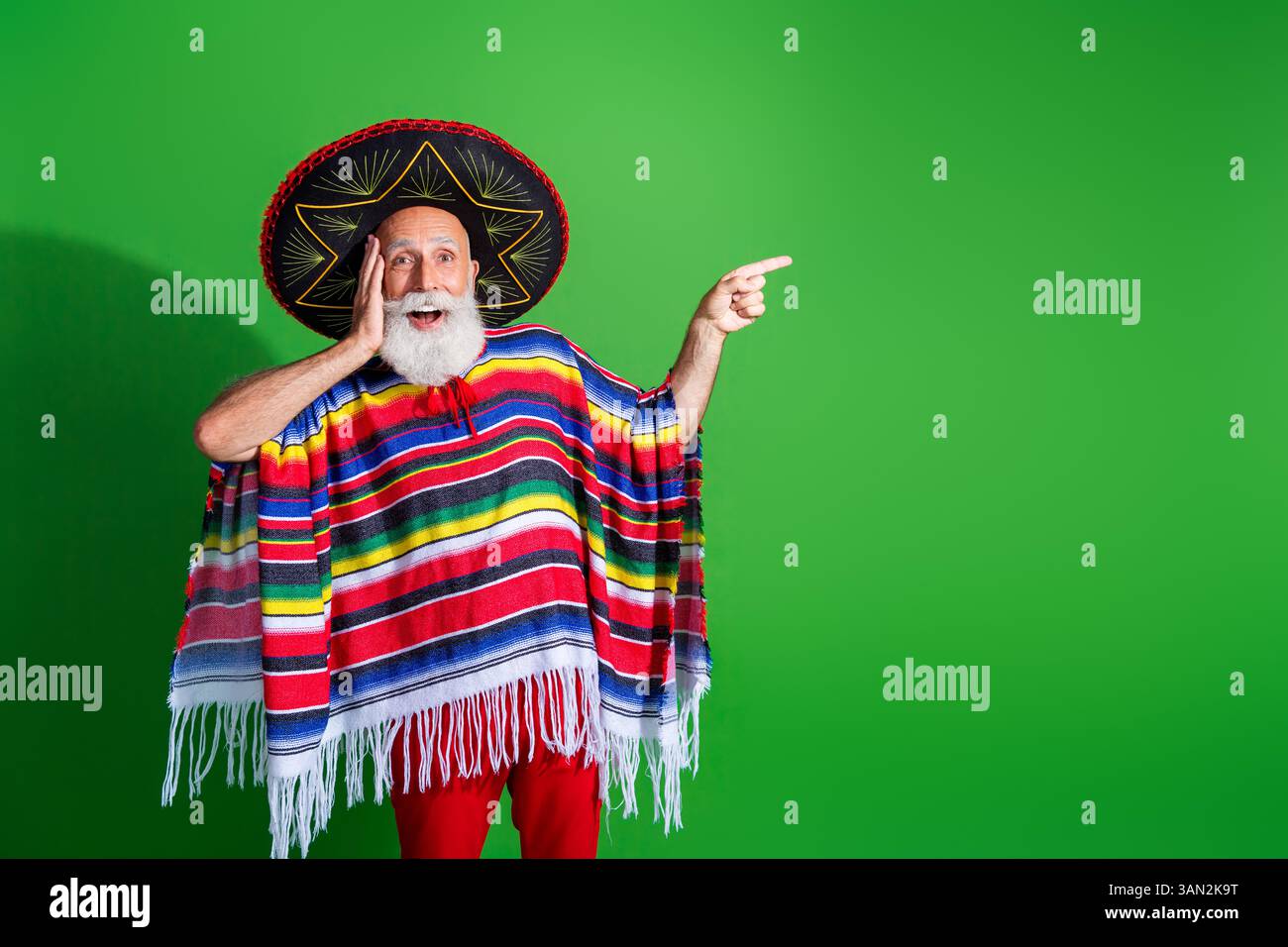 Charismatic old man in traditional Mexican attire posing ...