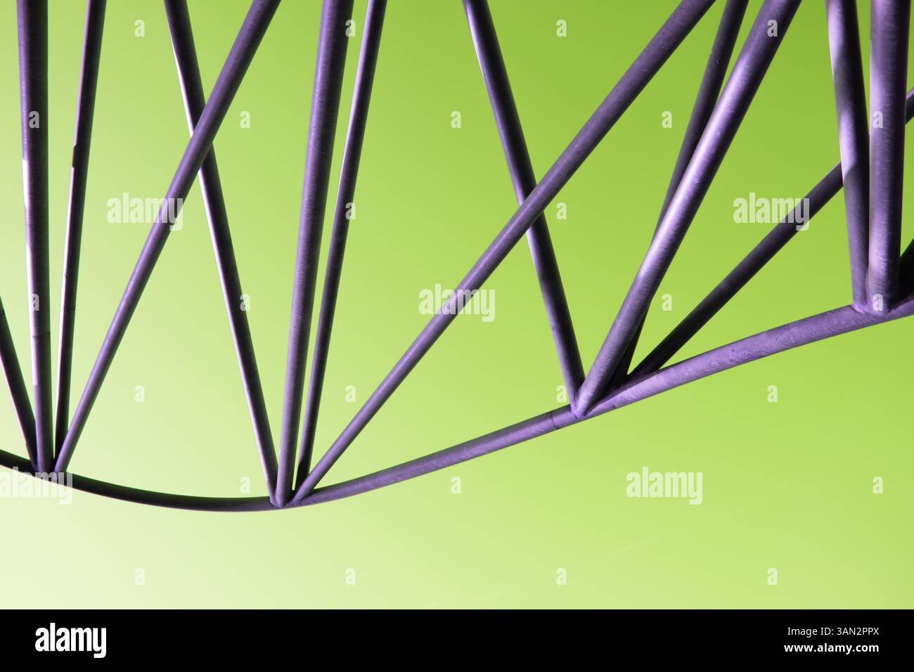 Modern metal artwork with welded pipes standing tall on vivid artistic ...