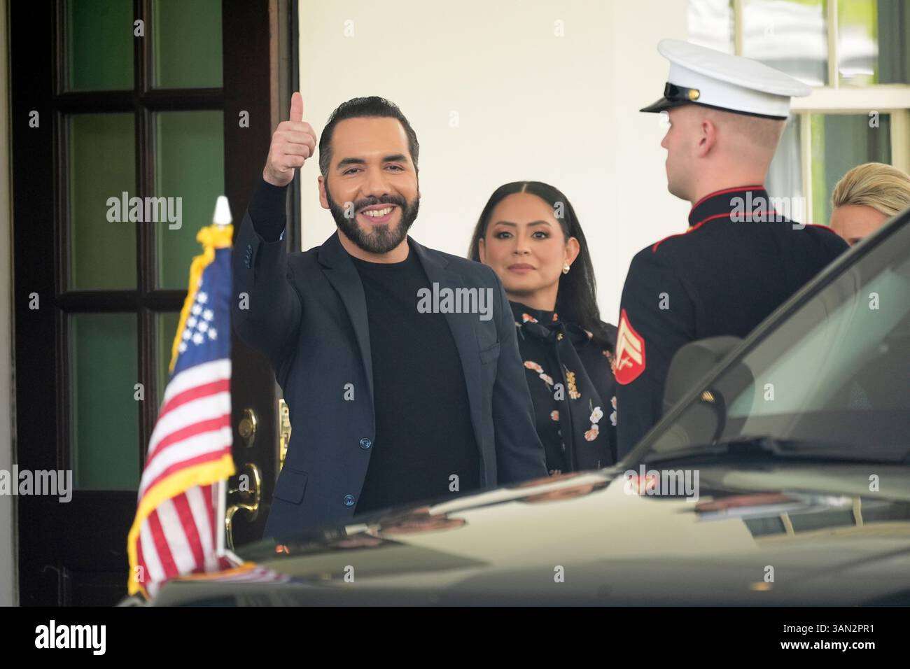 El Salvador's President Nayib Bukele gives a thumbs up as he departs ...