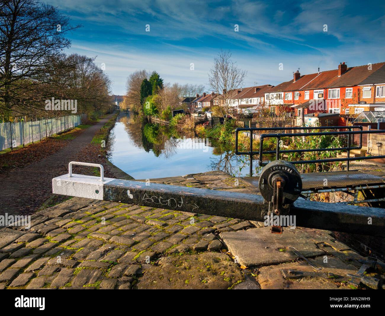 Lock gate balance beam at Lock 17 on the Ashton Canal, on a fine winter ...