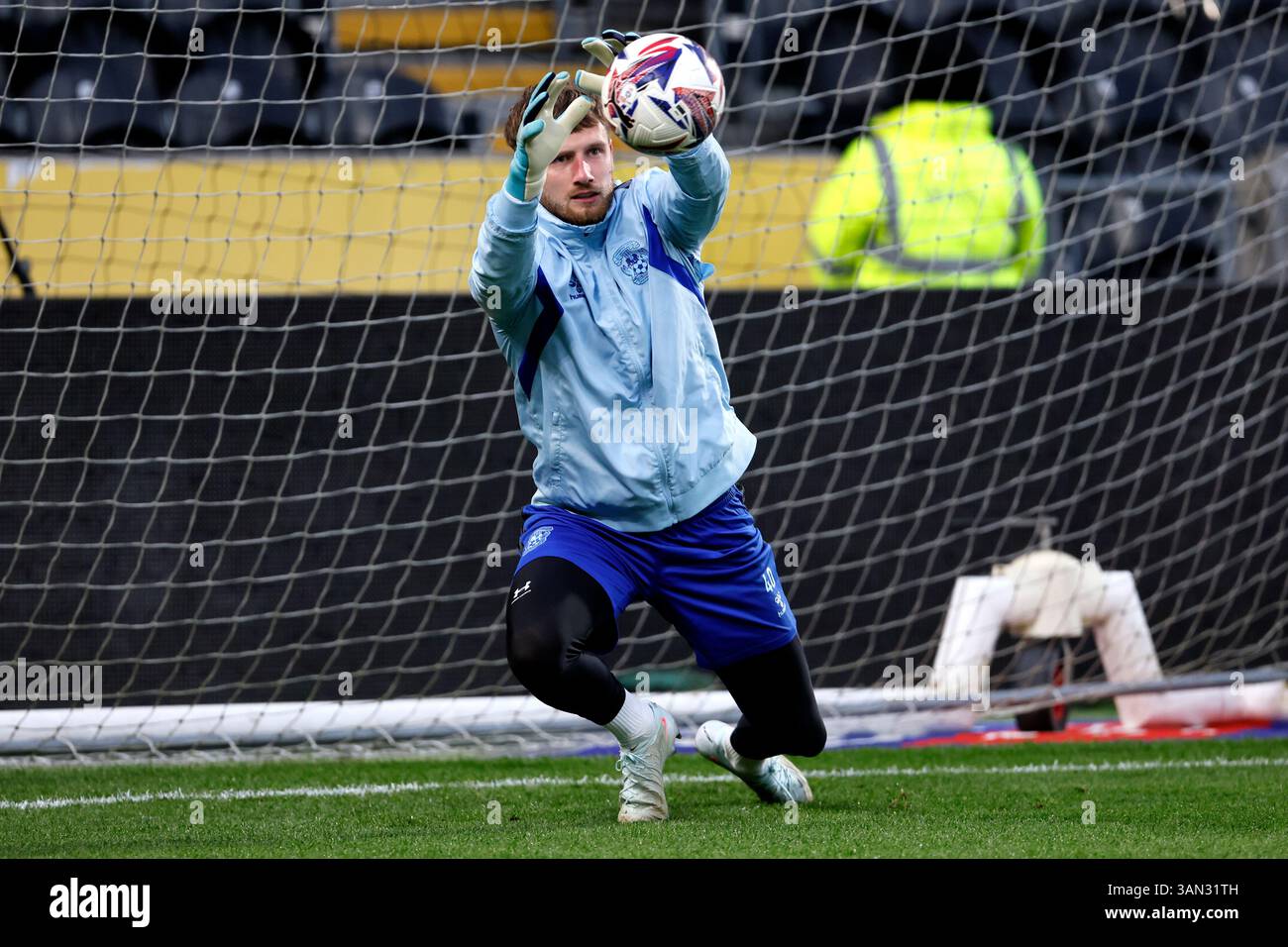 Coventry City goalkeeper Bradley Collins warming up prior to kick-off ...