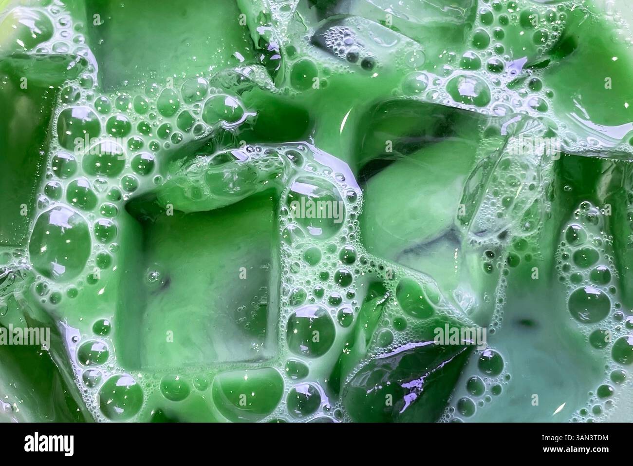 Detailed macro of fizzy drink with refreshing ice texture Stock Photo ...