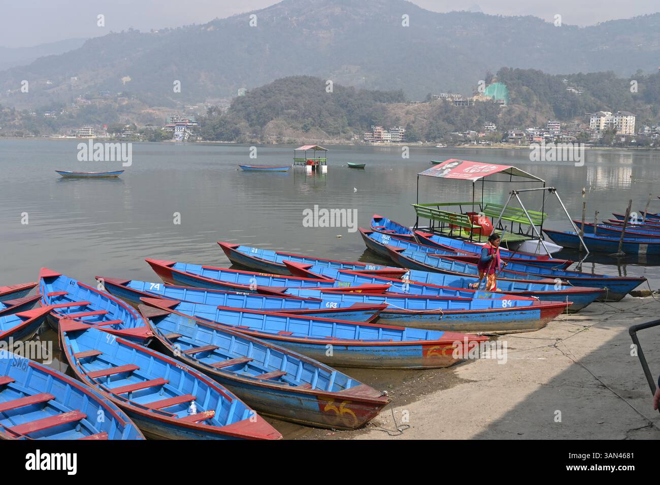 Colorful boats floating on lake Phewa, the second largest lake in Nepal ...