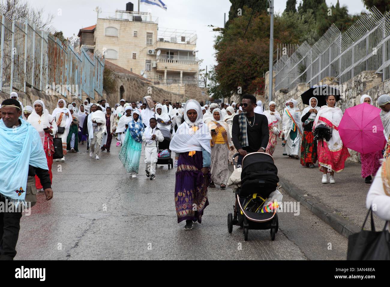 Palm Sunday Procession, Ethiopian Christian pilgrims mainly women & few kids walk from Mt ...