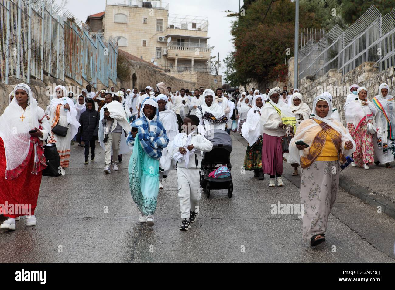 Palm Sunday Procession, Ethiopian Christian pilgrims mainly women & few kids walk from Mt ...