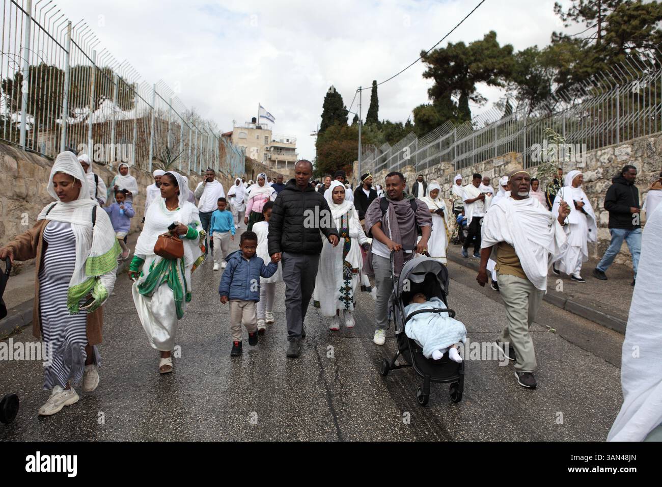 Palm Sunday Procession, Ethiopian Christian pilgrims mainly women & few kids walk from Mt ...