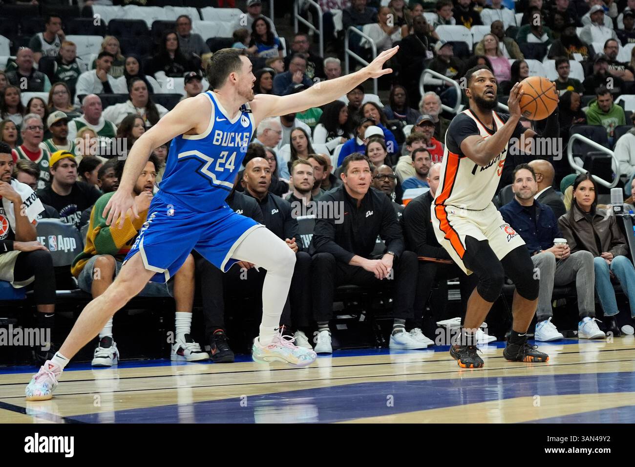 Detroit Pistons' Malik Beasley shoots against Milwaukee Bucks' Pat ...