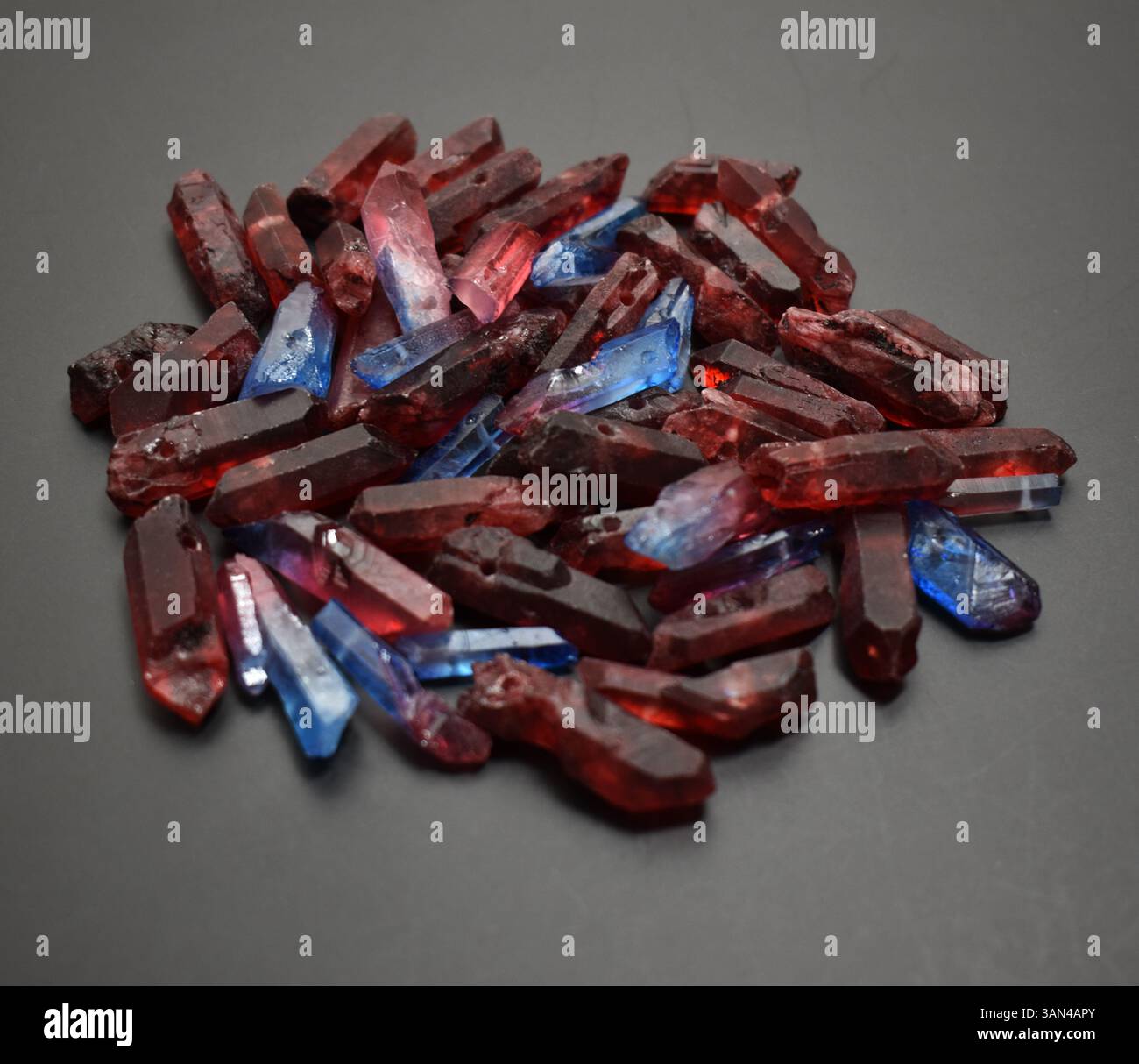 close up of clear quartz crystal formation on dark backdrop, rough ...