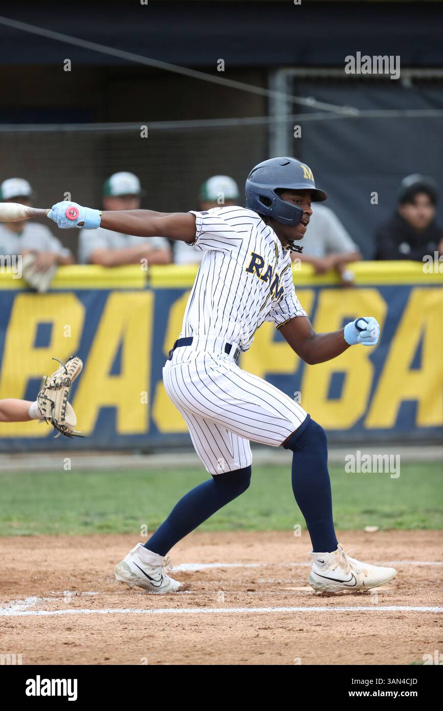Anthony Pack (6) of Milikan High School bats during a game against ...