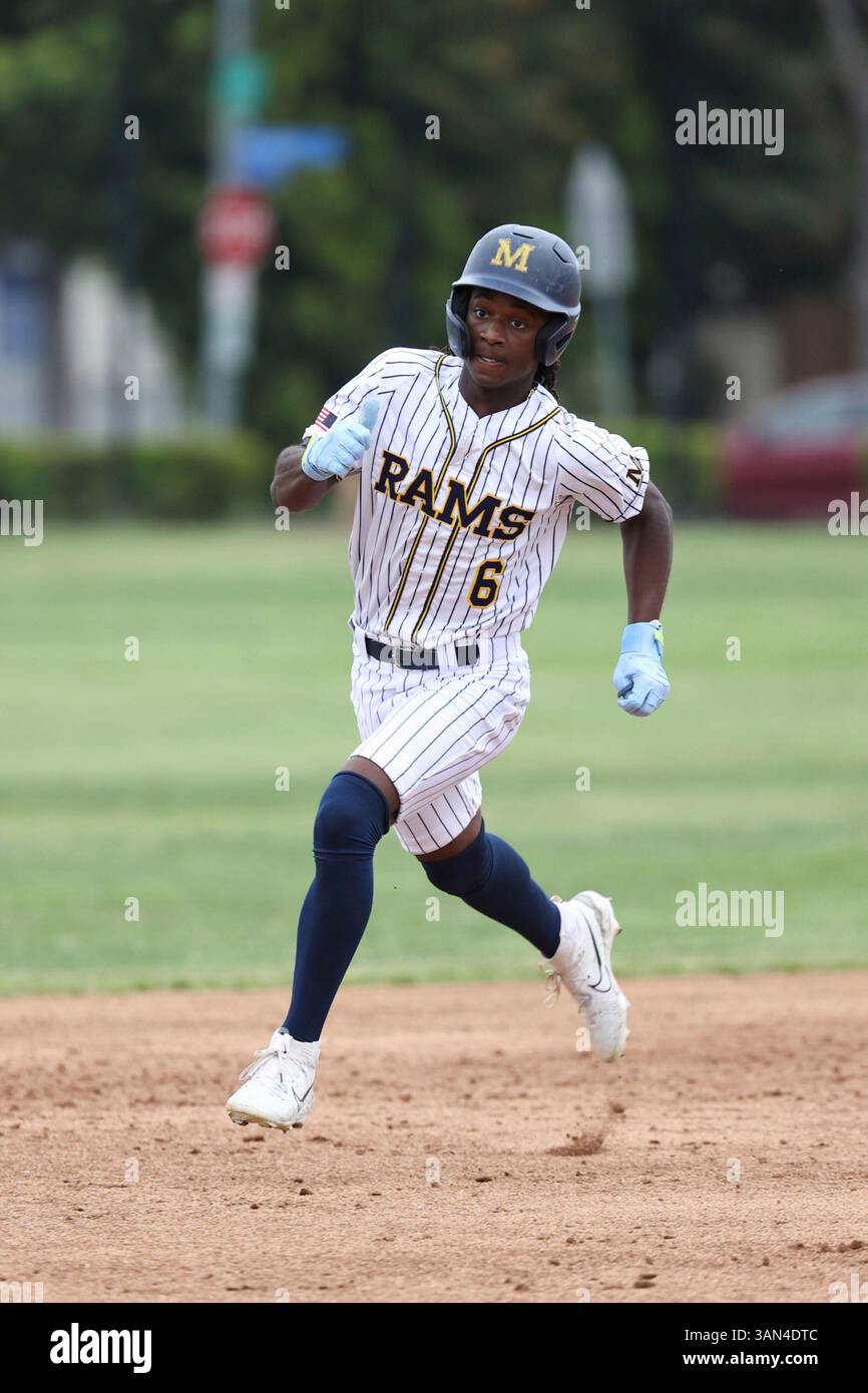Anthony Pack (6) of Milikan High School running the bases during a game ...