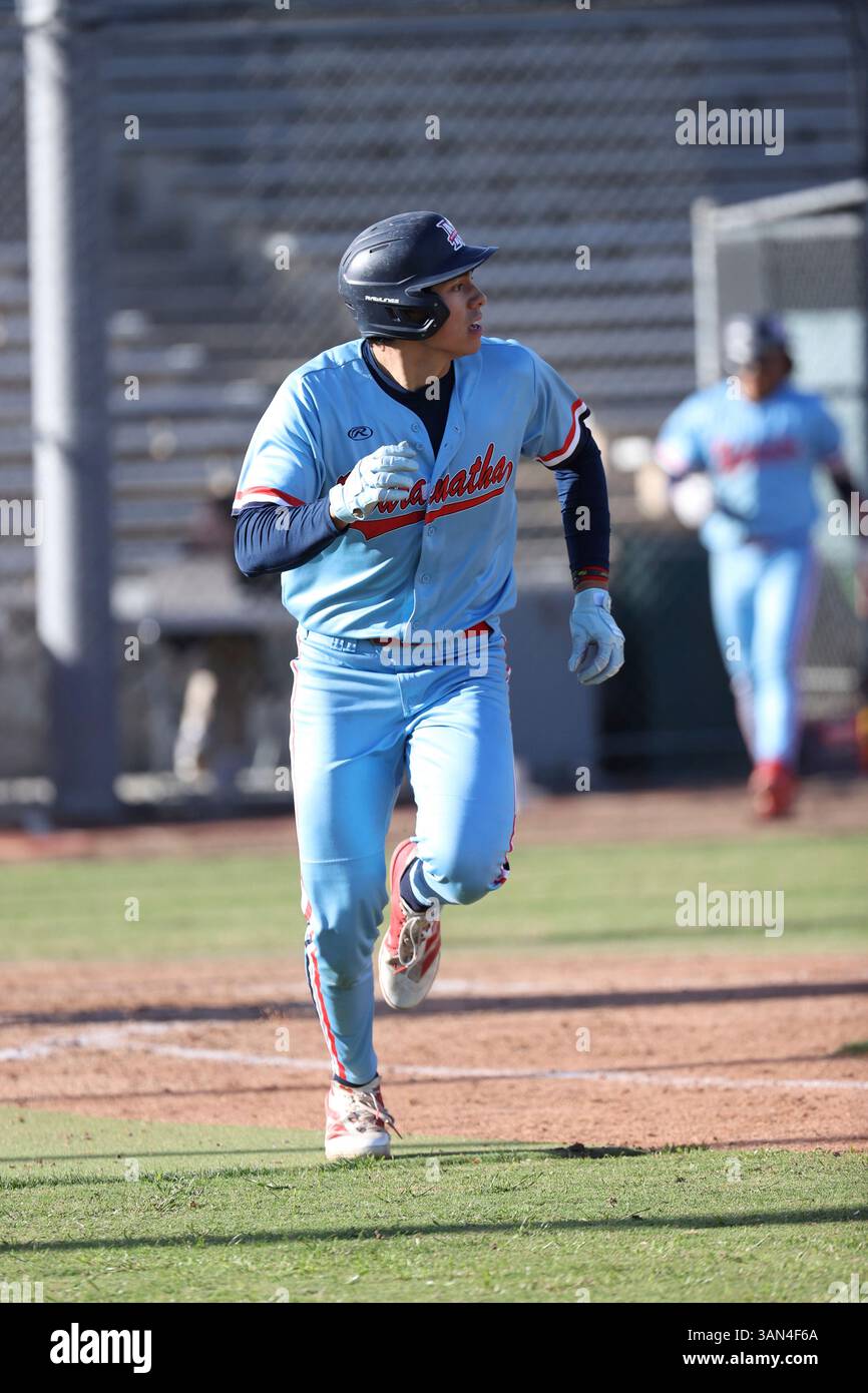 Josh Proctor of Maranantha High School runs to first base during a game ...