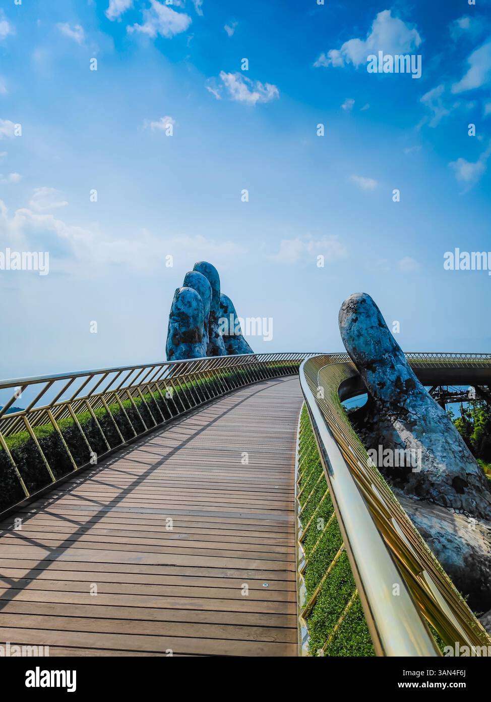 Empty Golden Bridge in Ba Na hills, Da Nang, Vietnam on a sunny day ...