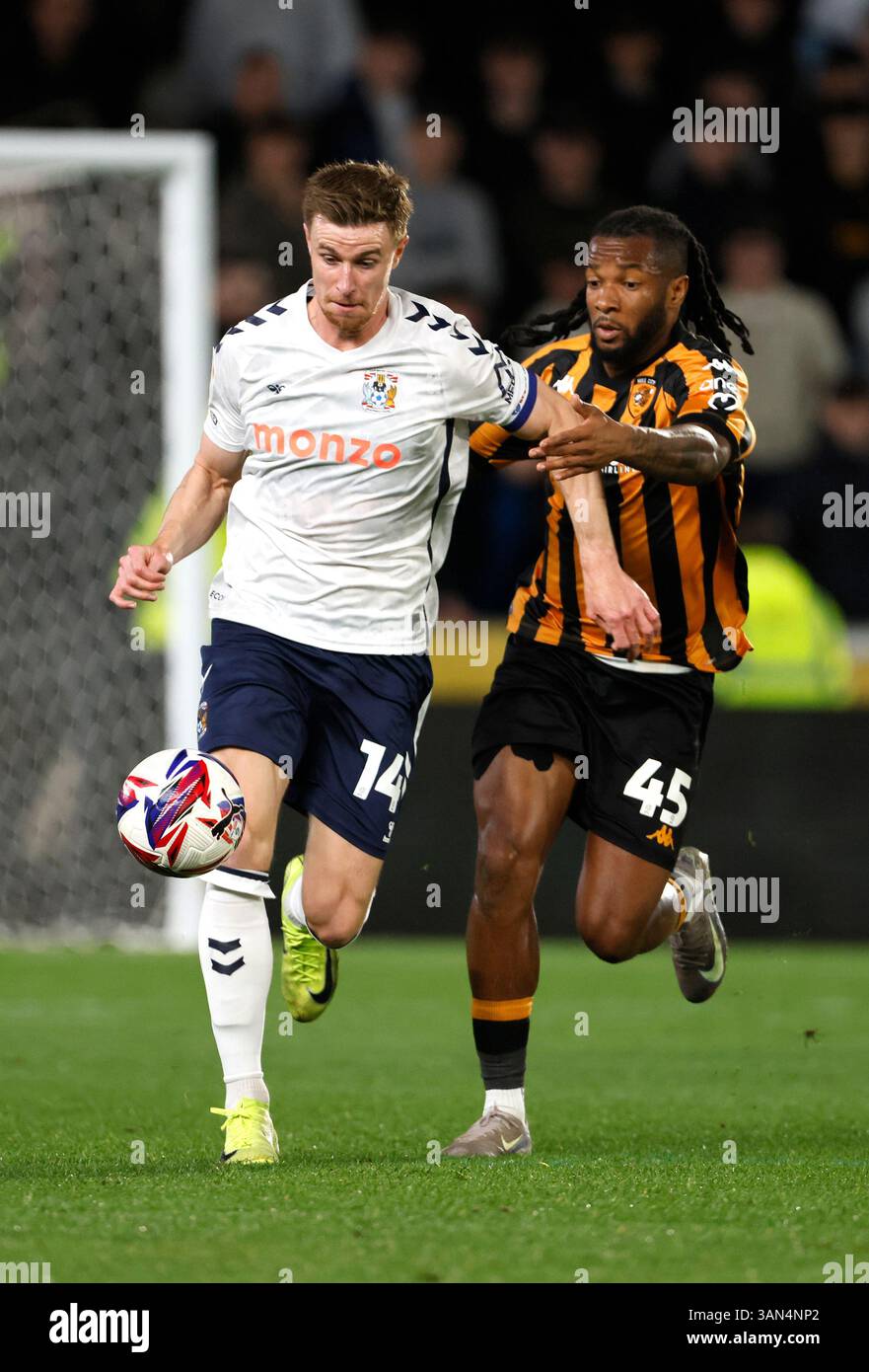 Coventry City's Ben Sheaf (left) and Hull City's Kasey Palmer battle ...