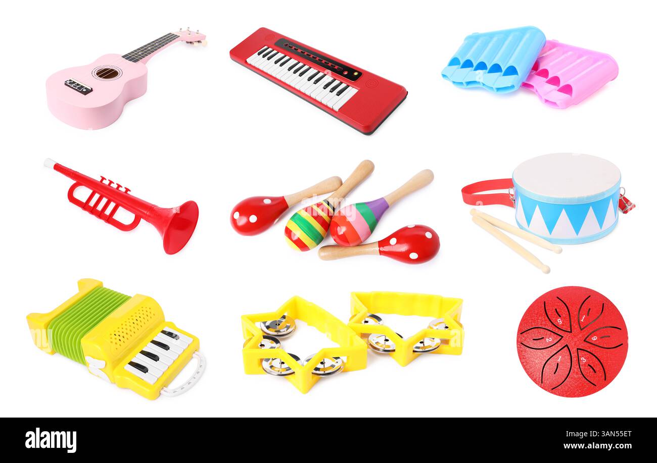 Different toy musical instruments for children on white background ...