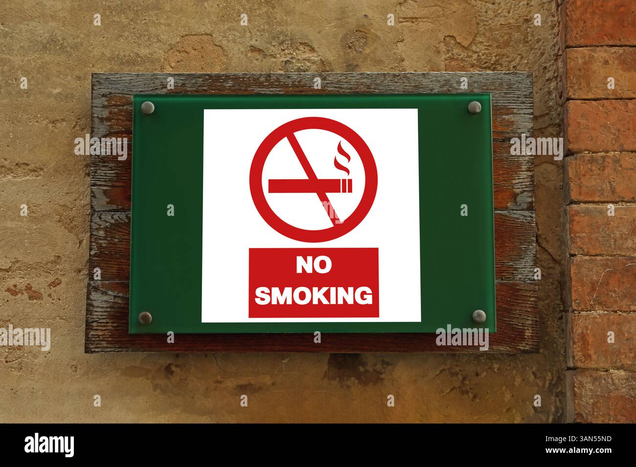 No Smoking sign on building wall outdoors Stock Photo - Alamy
